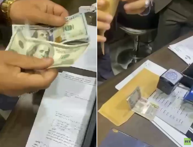 شاهد لحظة القبض على مسؤول عراقي متلبسا بتسلم رشوة
